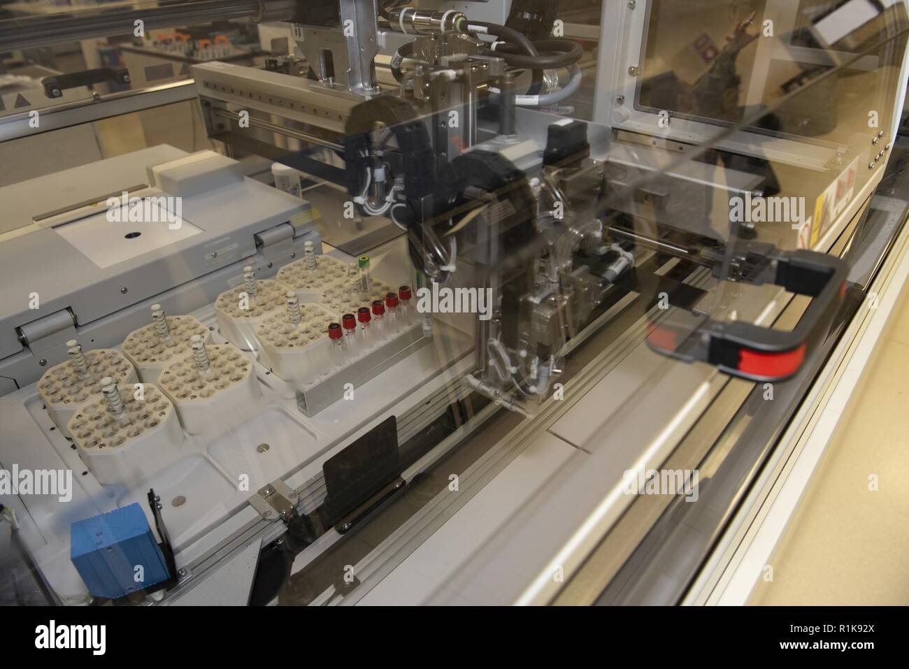 Samples are processed through a Siemens fully automated robotic testing ...