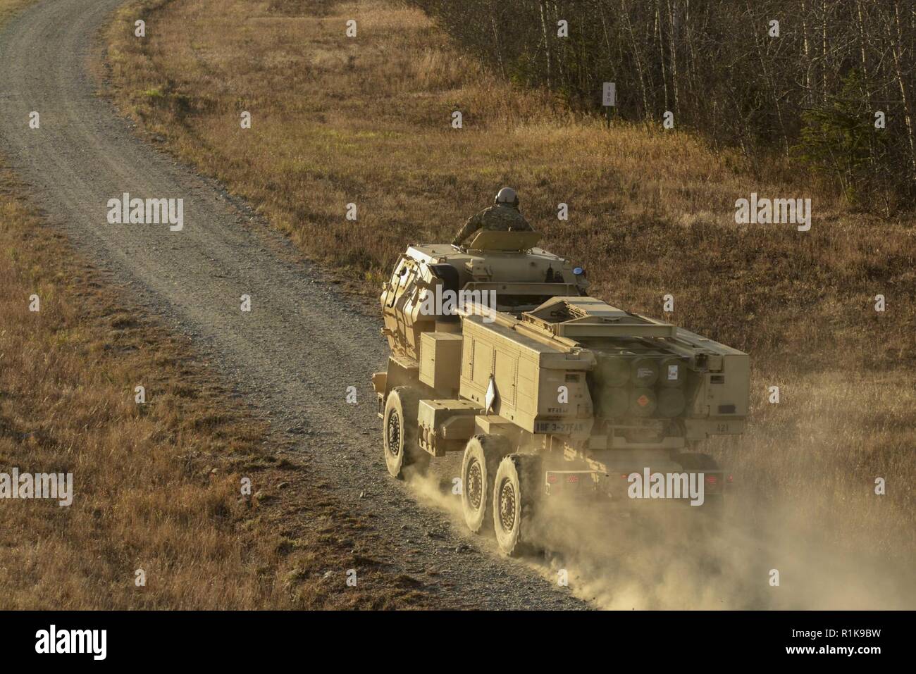 U.S. Army soldiers assigned to the 18th Field Artillery Brigade drive ...