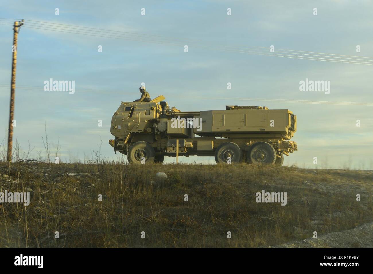 U.S. Army soldiers assigned to the 18th Field Artillery Brigade drive ...