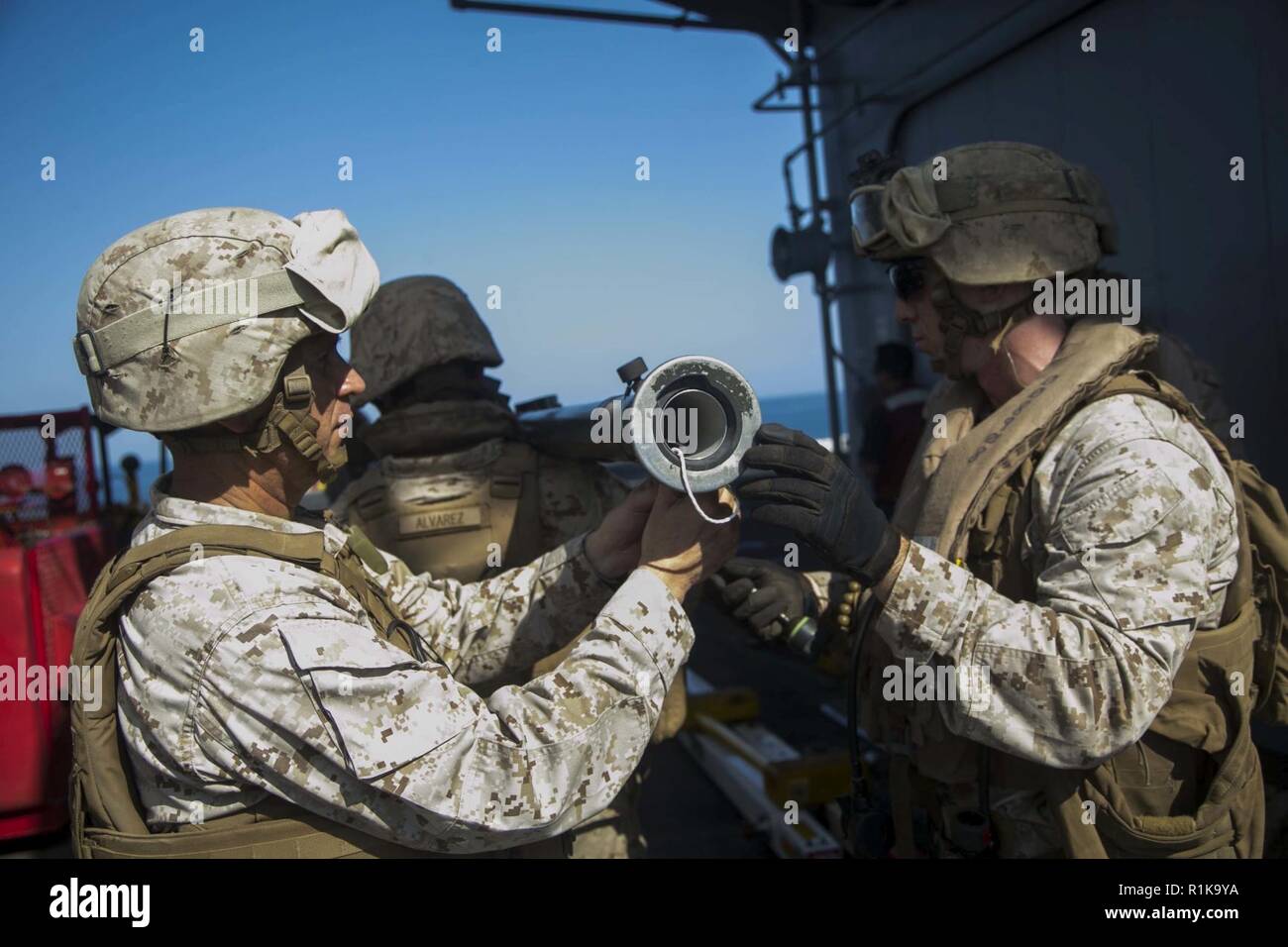 ARABIAN SEA-U.S. Marines Staff Sgt. Rogelio Villanueva and Sgt. Cameron ...