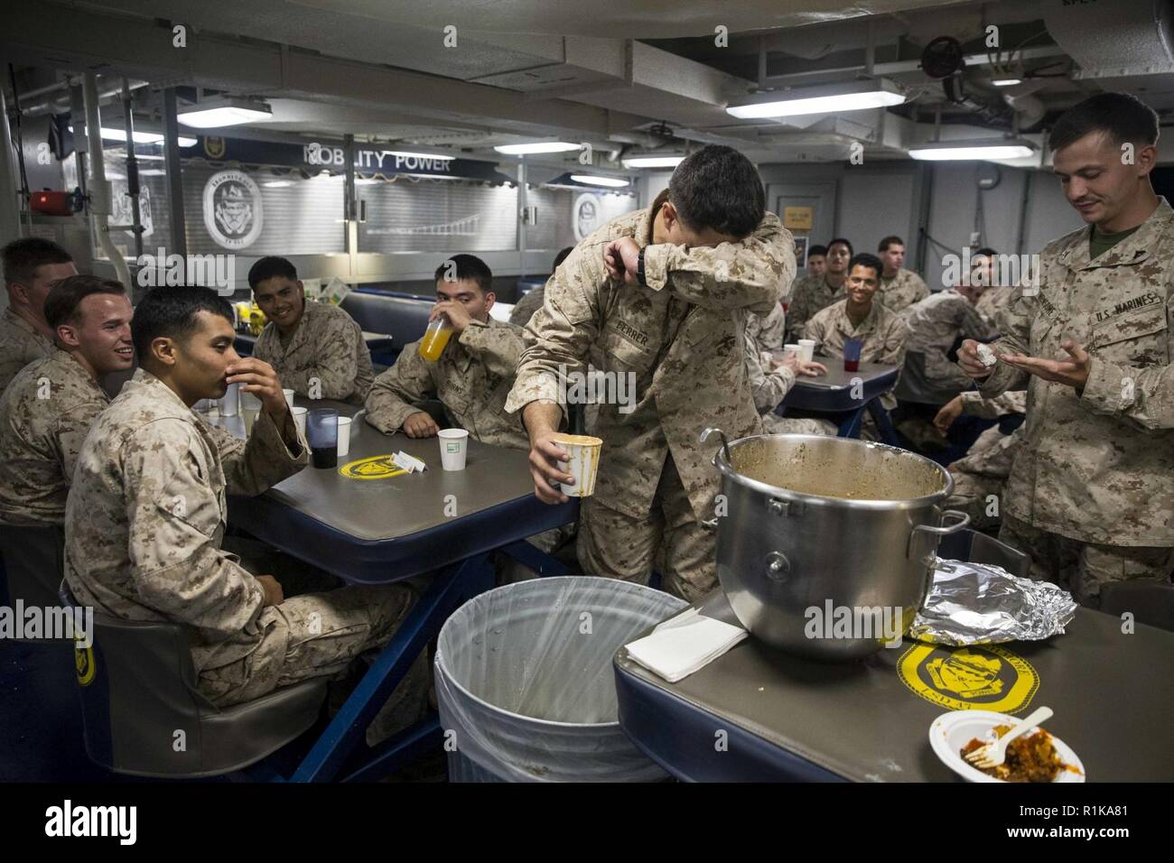GULF OF ADEN - U.S. Marine Cpl. Amaury Ferrer, center, a wrecker ...