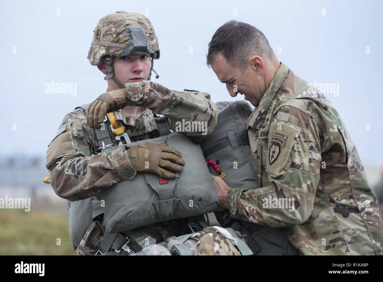Army Lt. Col. Matthew Myer, right, the commanding officer of the 1st ...