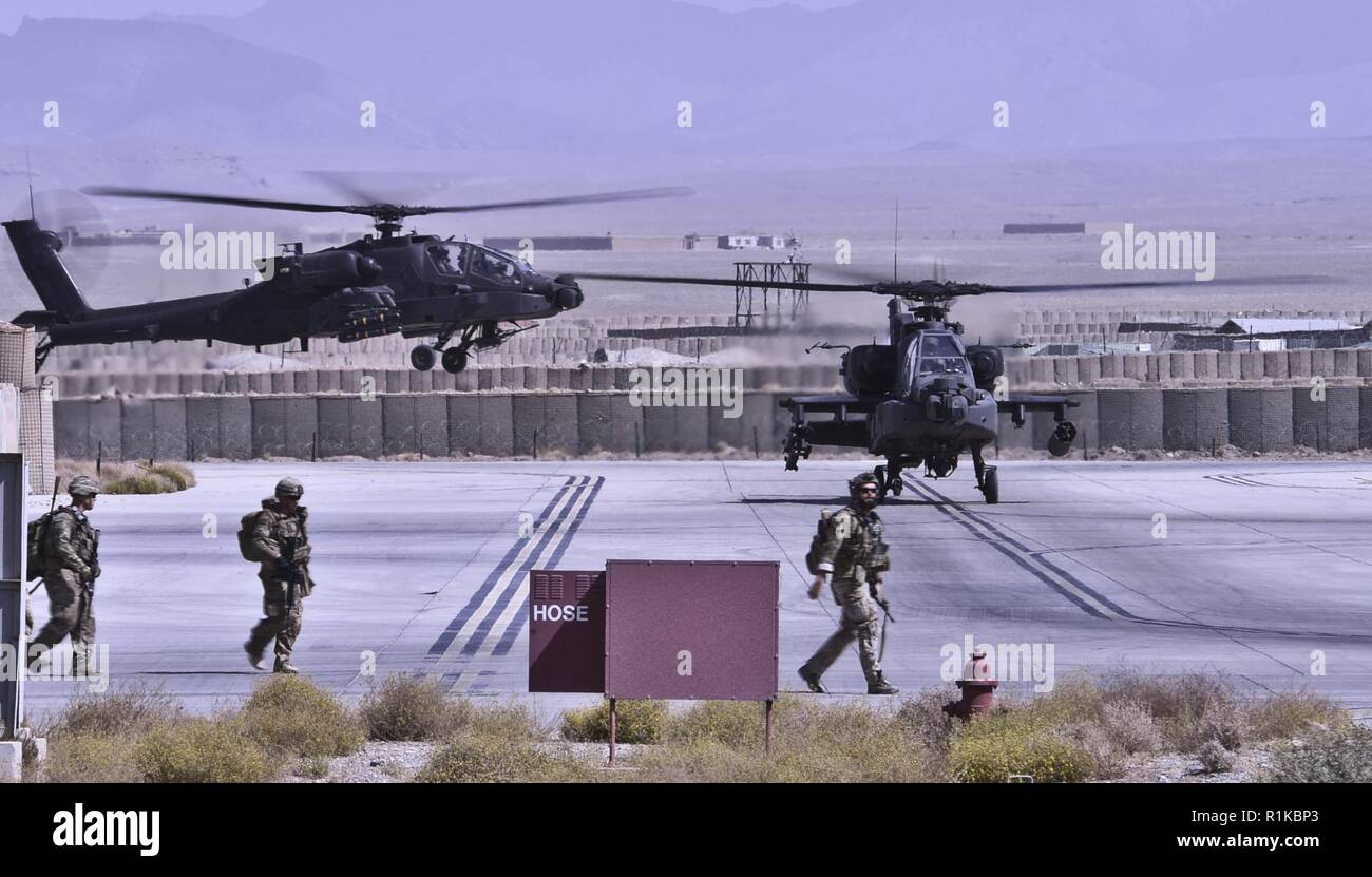 U.S. Army AH-64 Apache helicopters assigned to Task Force Eagle Assault ...