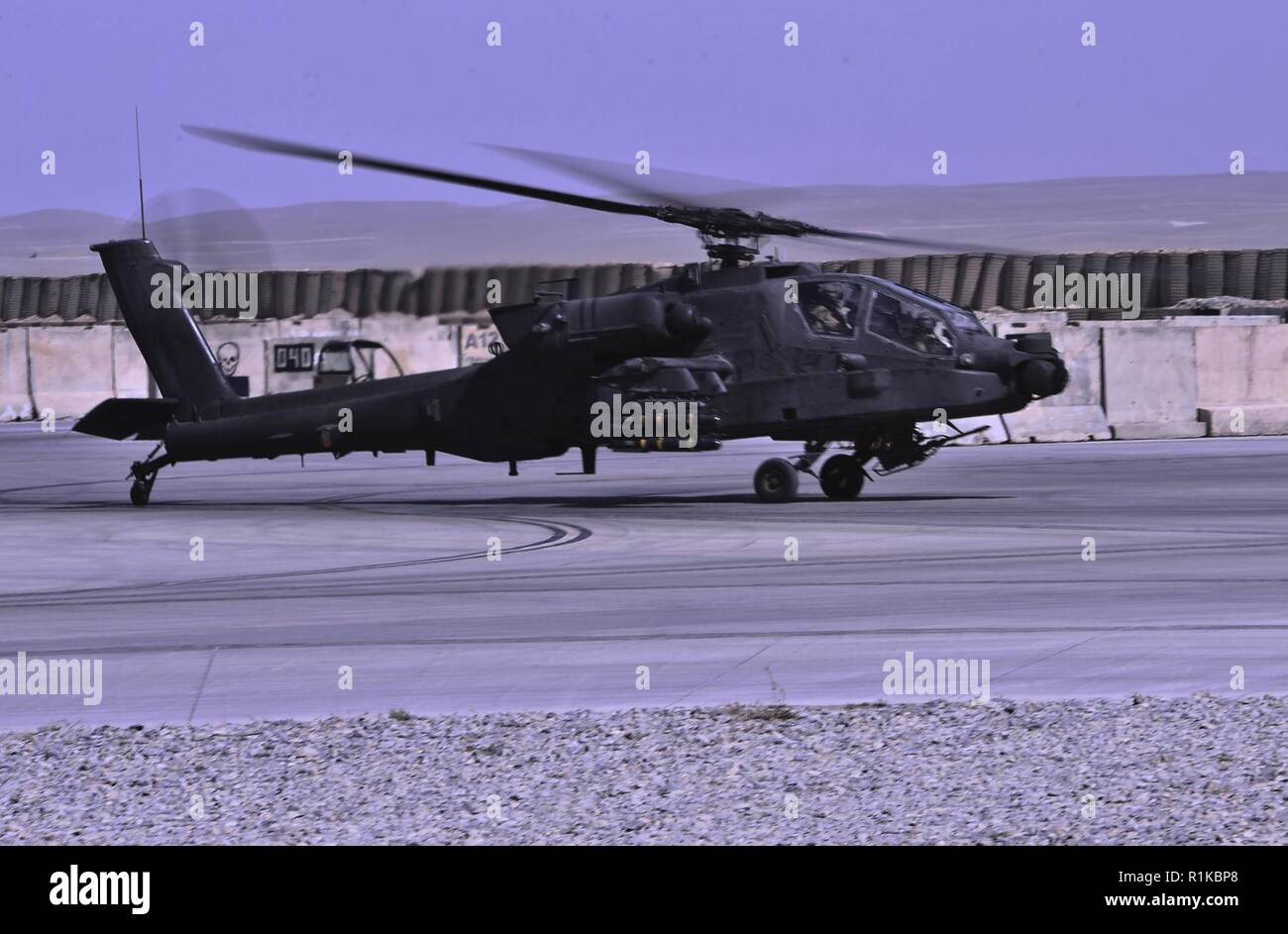 U.S. Army AH-64 Apache helicopters assigned to Task Force Eagle Assault ...