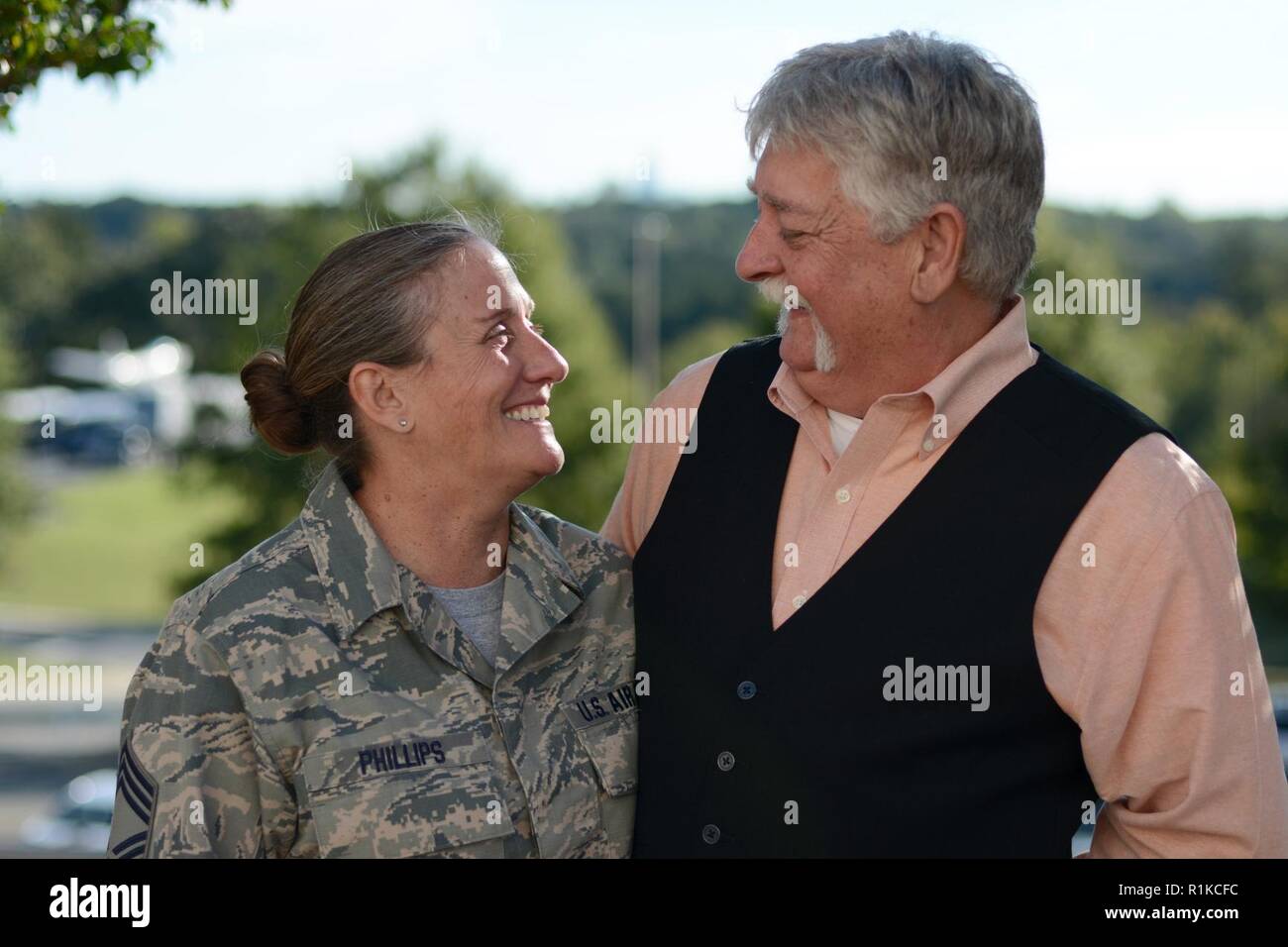 U.S. Air Force Chief Master Sgt. Lisa Phillips (left) poses for family ...