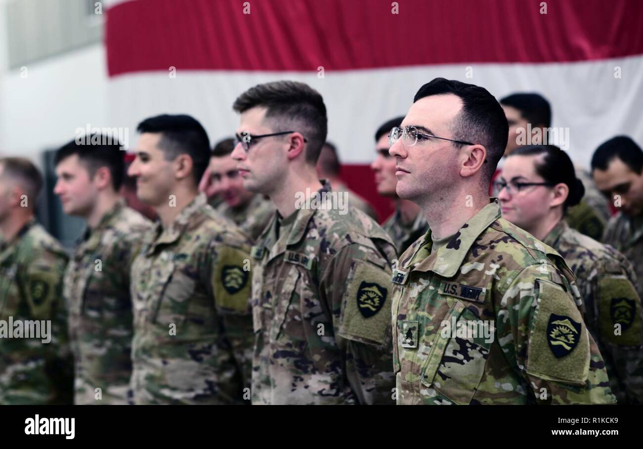 Oregon Army National Guard Soldiers with the 1186th Military Police Company stand in formation ...
