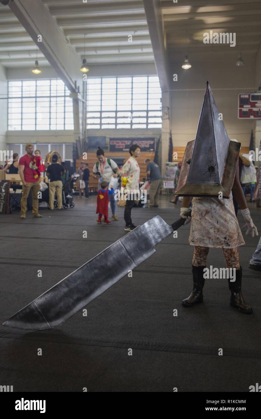 A cosplayer poses for a photo during the Okinawa Comic Con on Camp ...