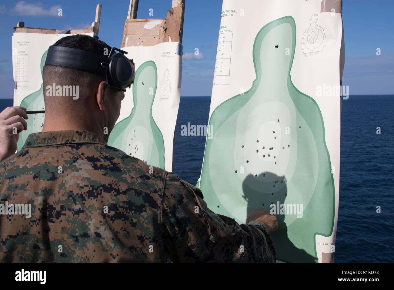 Gunnery Sgt. Jesus Cisneros Jr., the range safety officer and the ...
