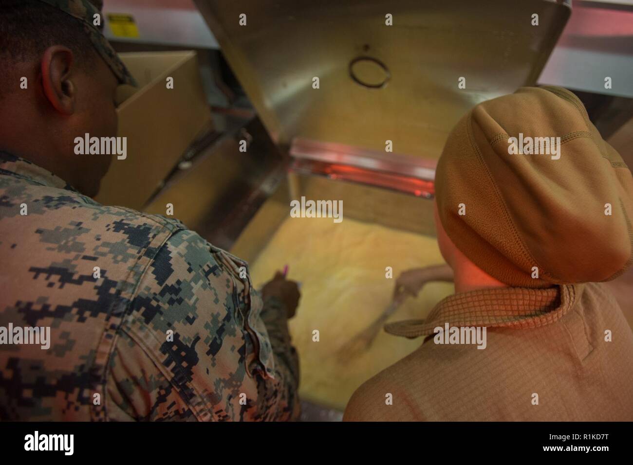 U.S. Marine Corps Sgt. Noah Lambert, and Cpl. Kayla Reyes, with ...