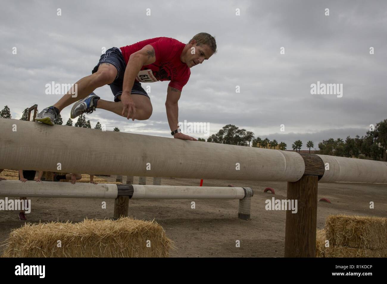 A participant overcomes an obstacles at the 17th annual Boot Camp ...