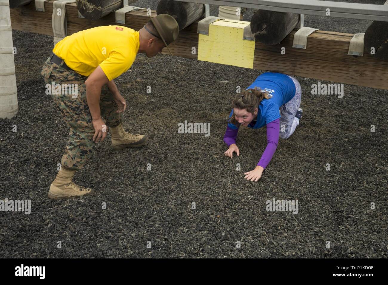 Participants are motivated through obstacles during the 17th annual Boot Camp Challenge on ...