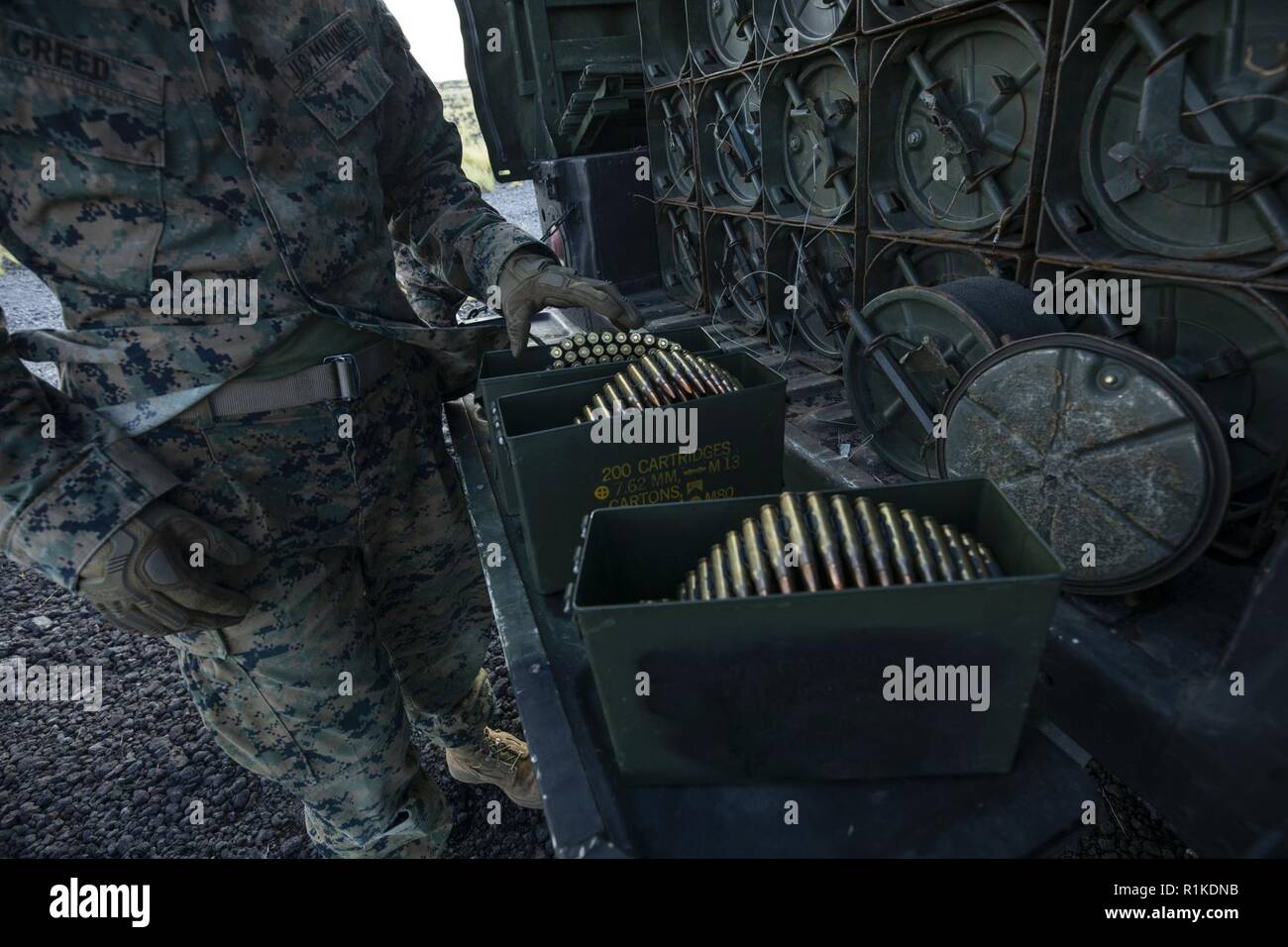 A U.S. Marine with Marine Light Attack Helicopter Squadron 367 prepares ...