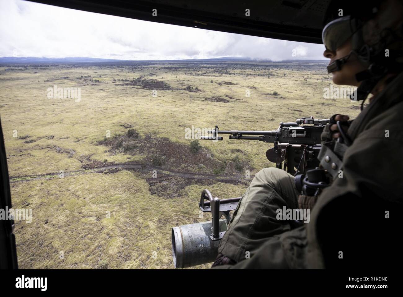 A U.S. Marine Corps crew chief with Marine Light Attack Helicopter ...