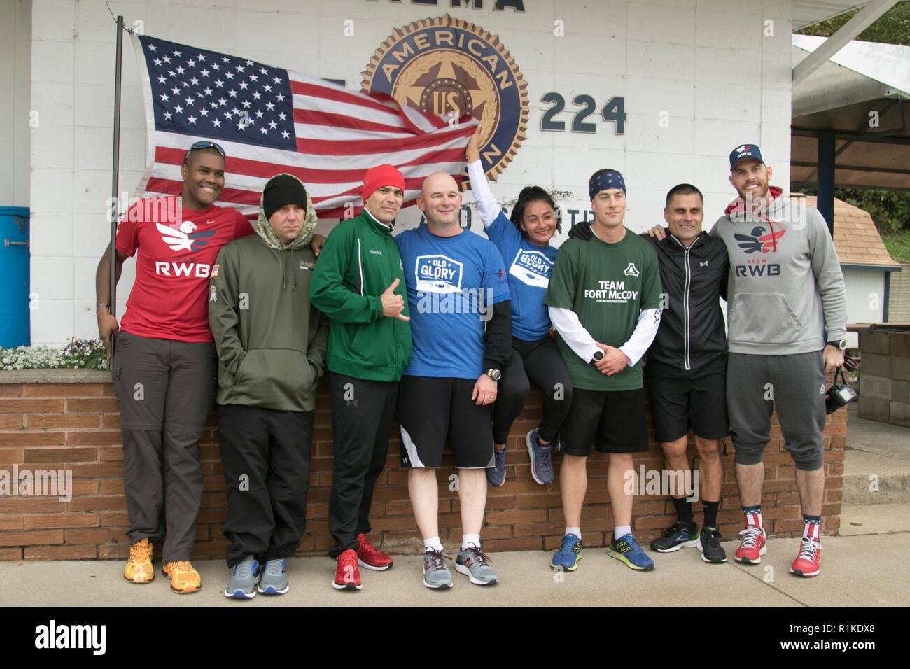 Soldiers from Fort McCoy and members of Team RWB stand in front of ...