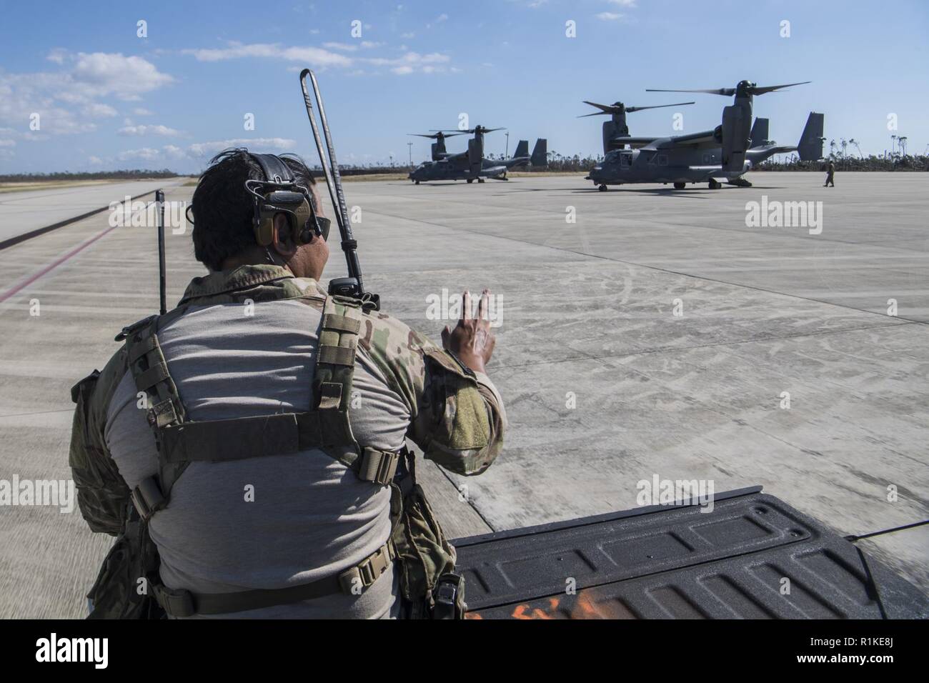 A Special Tactics Airman with the 23rd Special Tactics Squadron waves ...