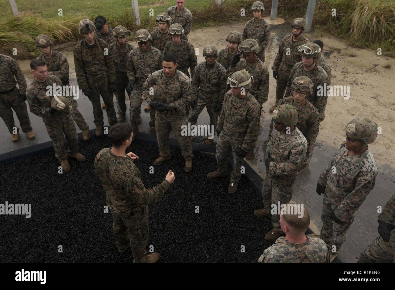 U.S. Marine Staff Sgt. Timothy Gregg briefs his Marines before ...