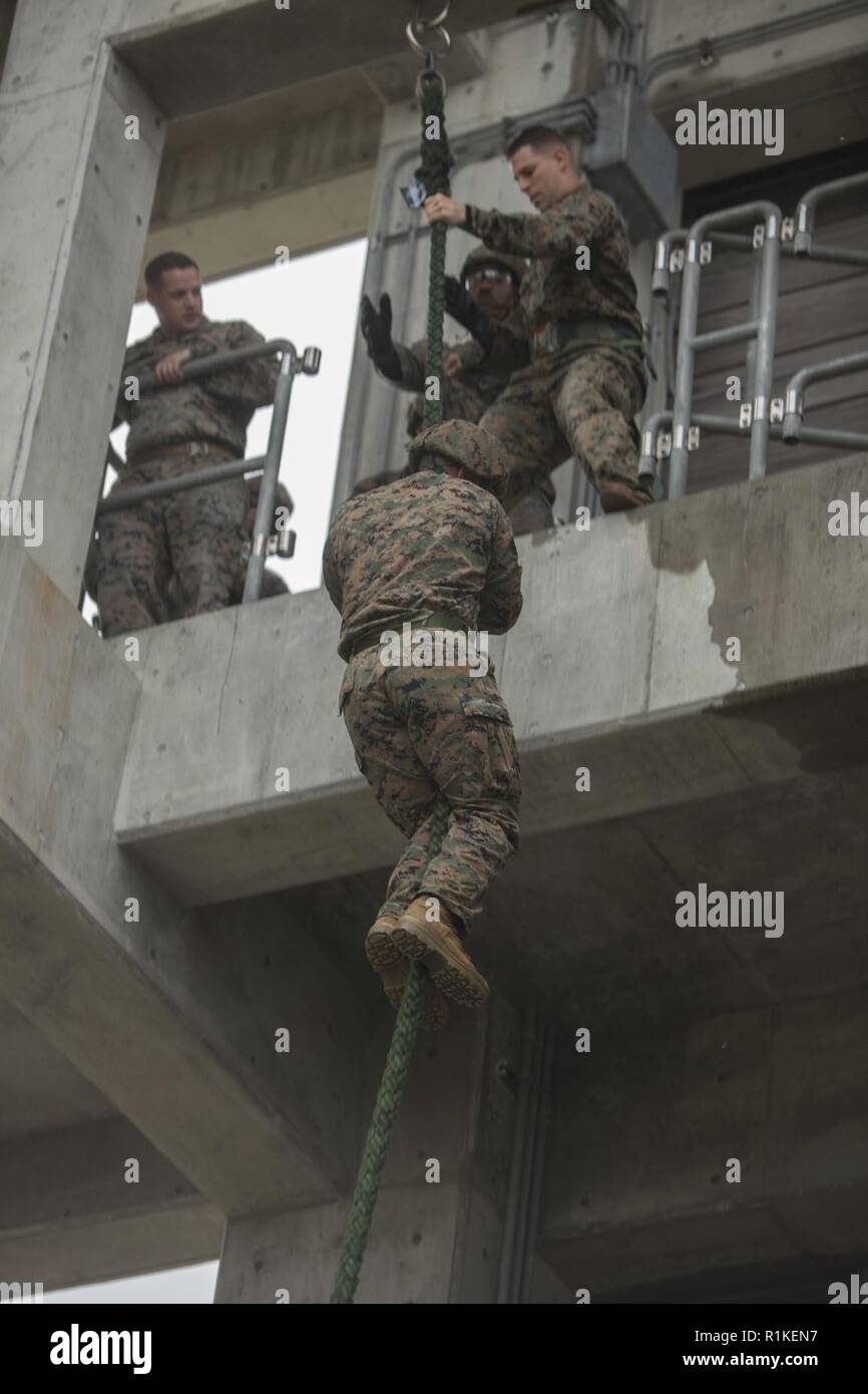 U.S. Marine Sgt. Justin Gomez fast ropes during helicopter rope ...