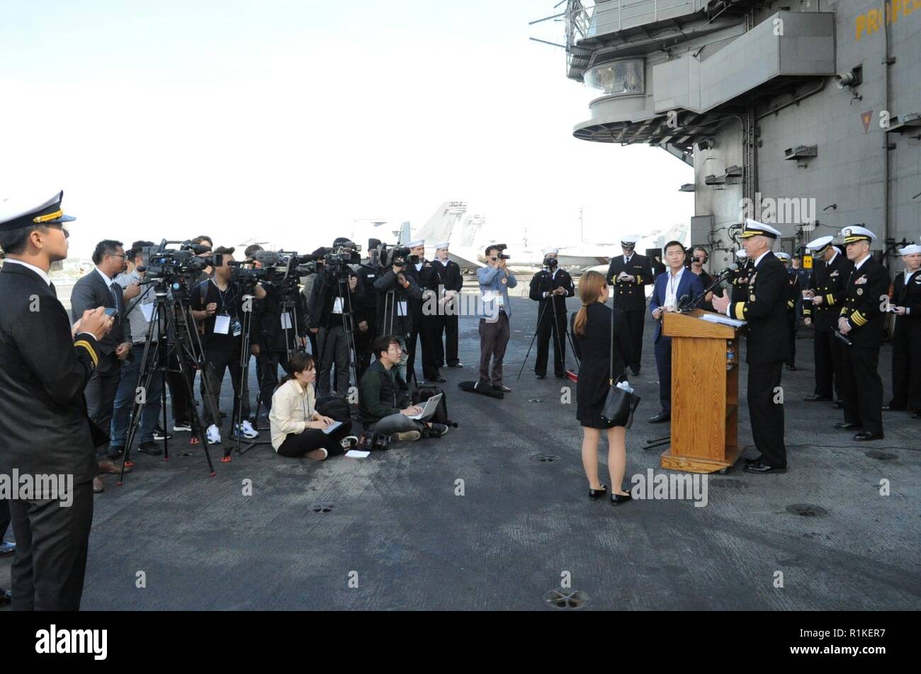 Rear Adm. Karl O. Thomas, commander, Task Force (CTF 70) speaks to ...