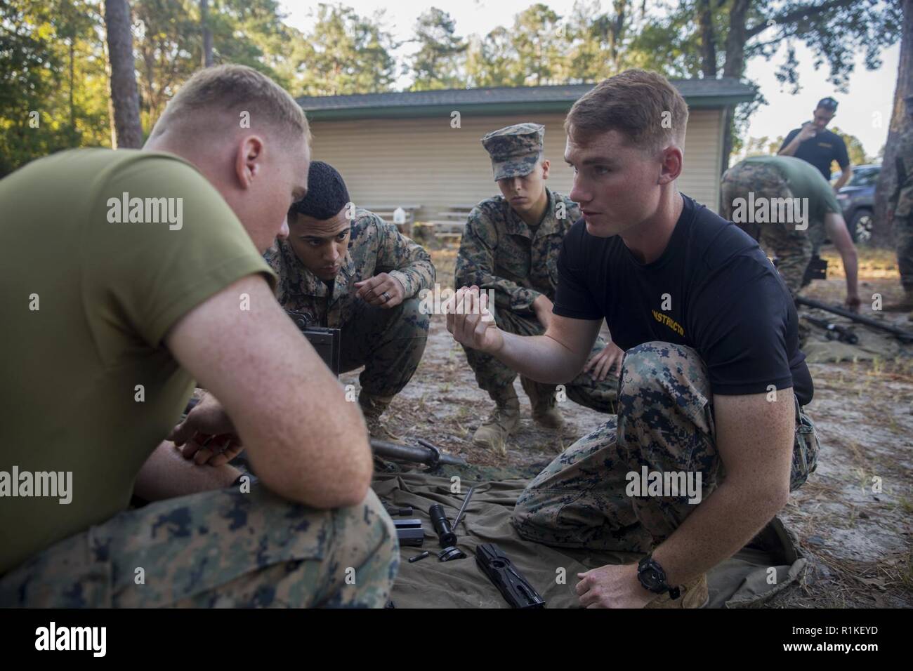 U.S. Marine Corps Sgt. Kevin Blankenship, right, with Battle Skills ...