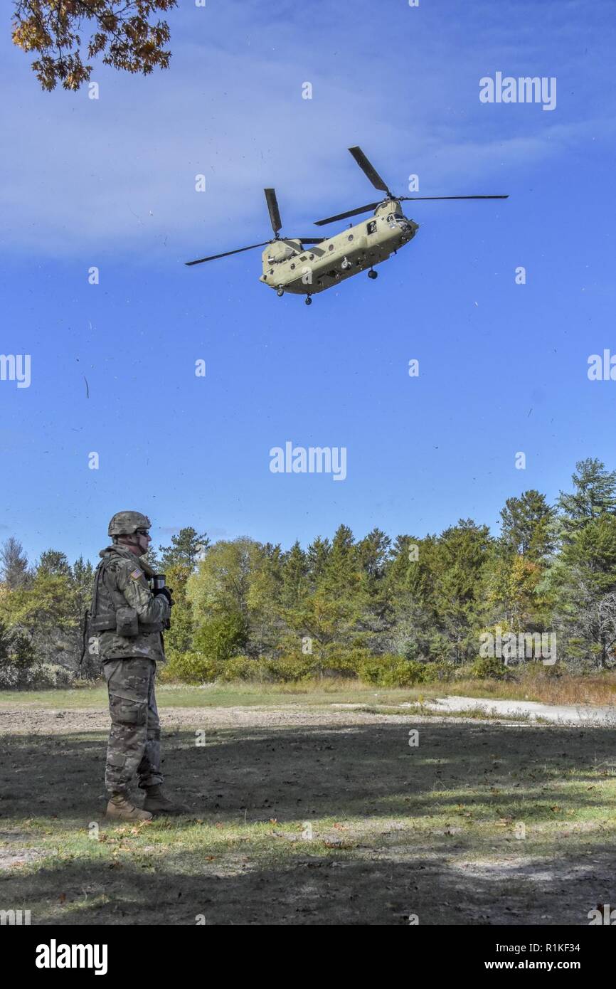 Air and ground forces from the Michigan National Guard work together to ...