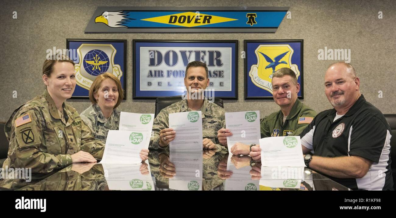 From left, Lt. Col. Laura Wood, Joint Personal Effects Depot commander ...