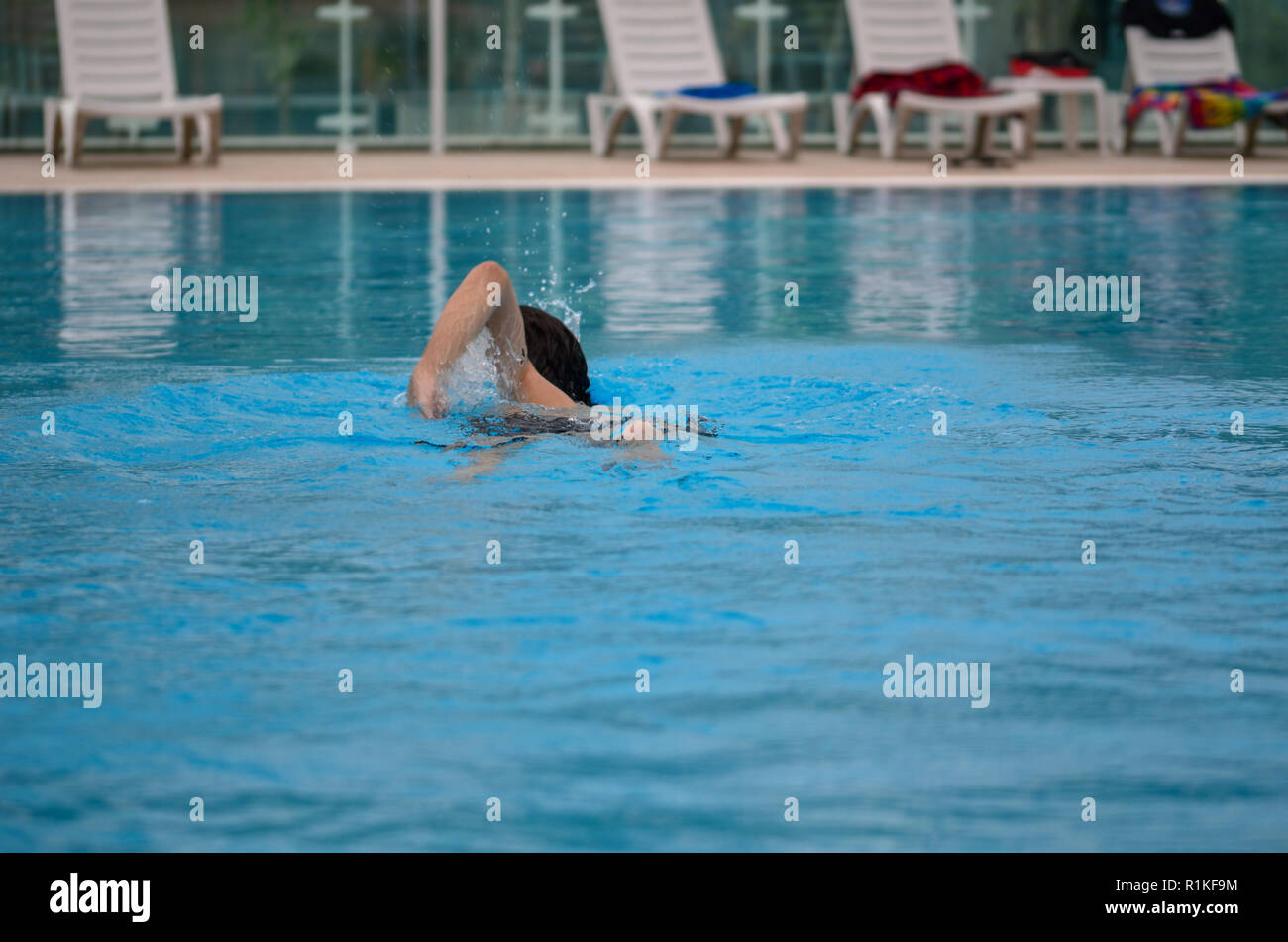 Man inside pool hi-res stock photography and images - Alamy