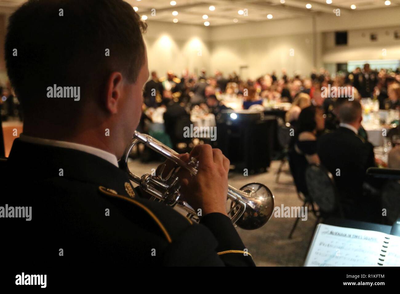 A musician from 56th Army Band (America's First Corps Band) performs at ...