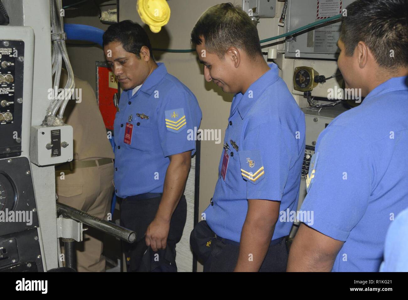 Crew members from the Peruvian submarine BAP Arica (SS-36) tour the ...