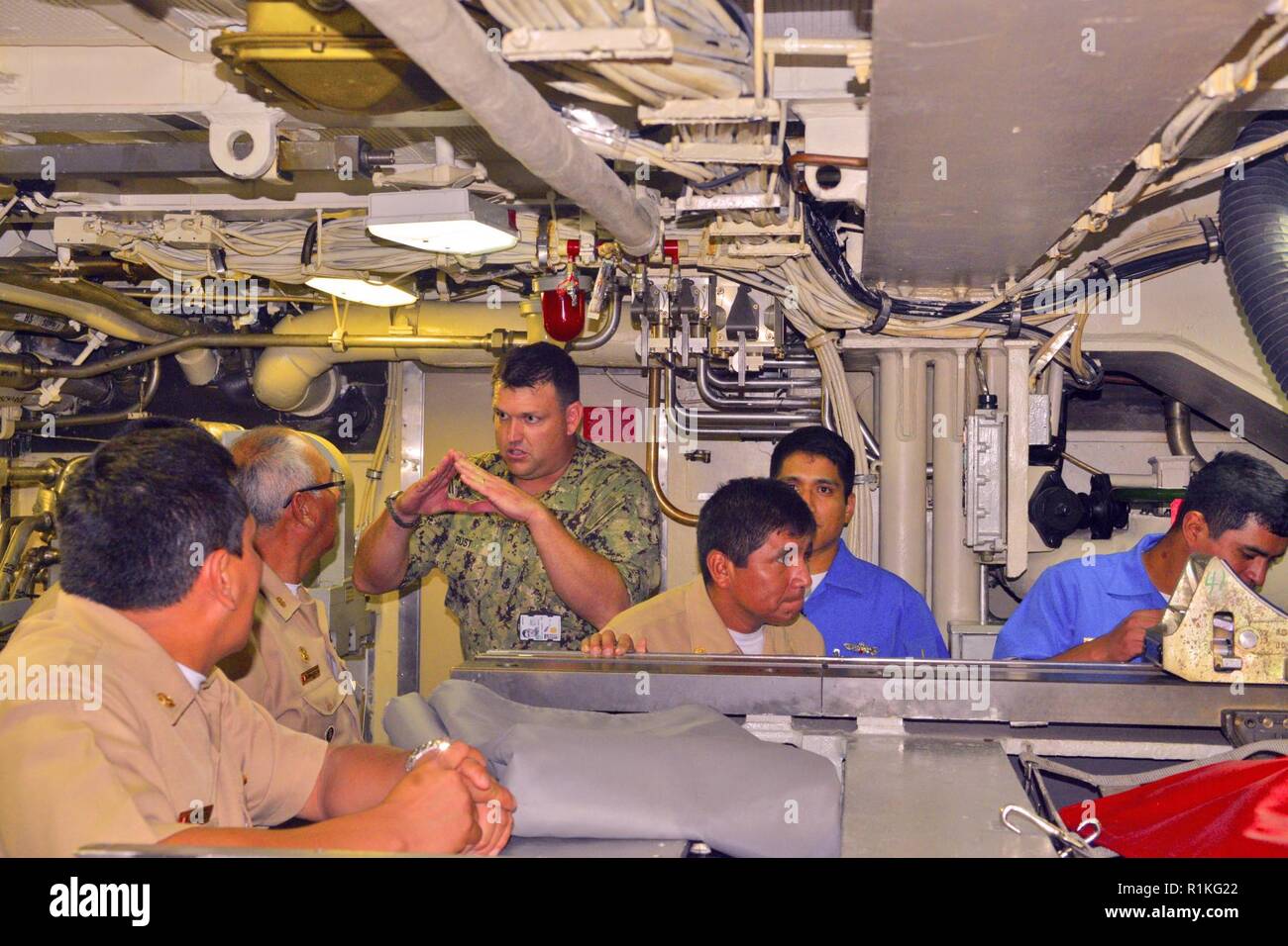 Crew members from the Peruvian submarine BAP Arica (SS-36) tour the ...