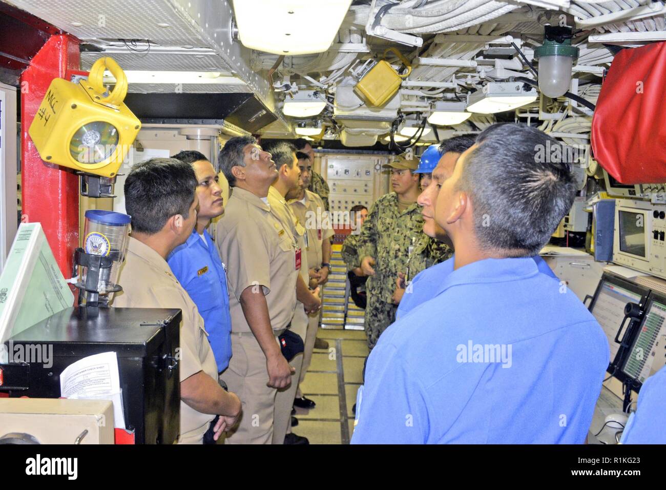 Crew members from the Peruvian submarine BAP Arica (SS-36) tour the ...