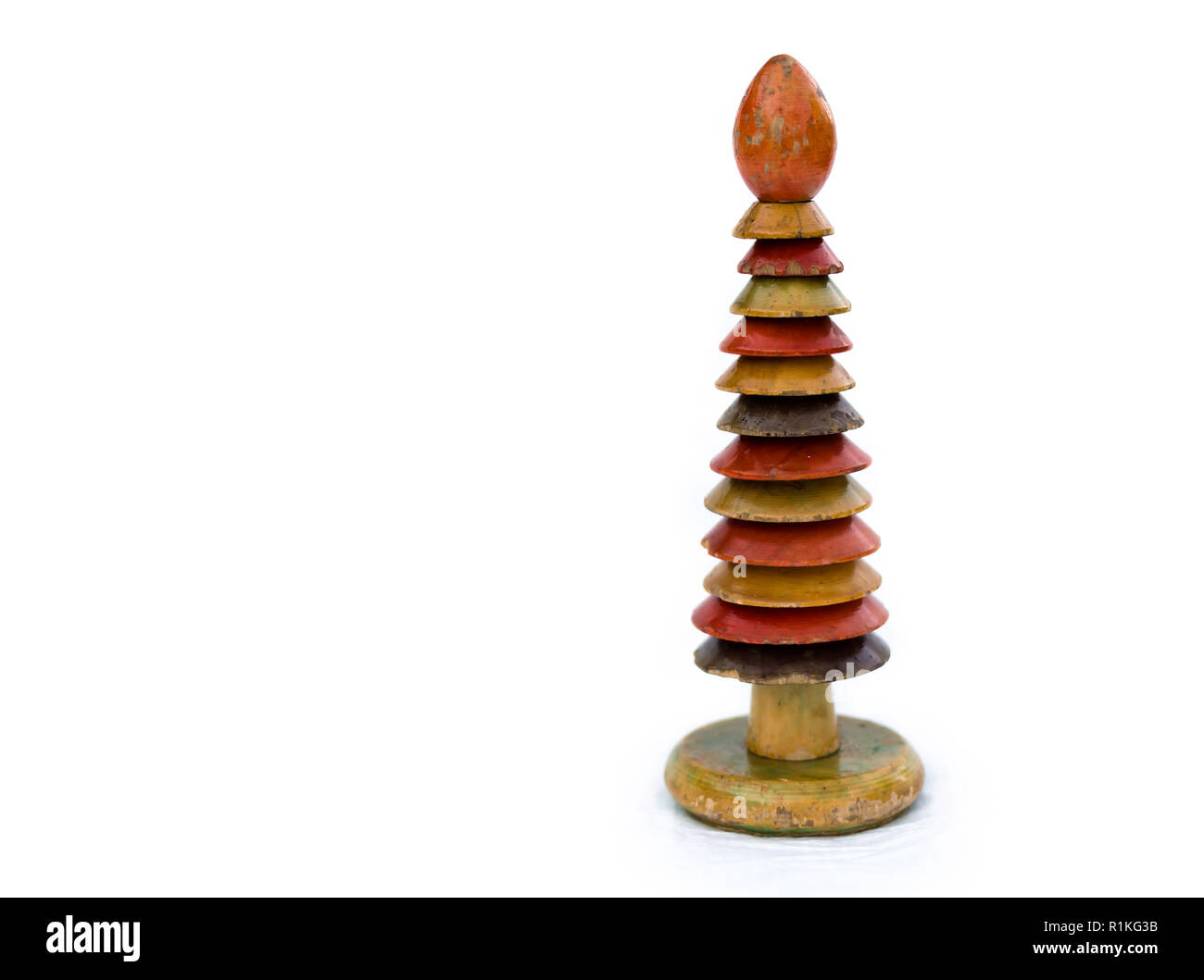 Old vintage wooden ring stacker isolated on white background. Stacking ...