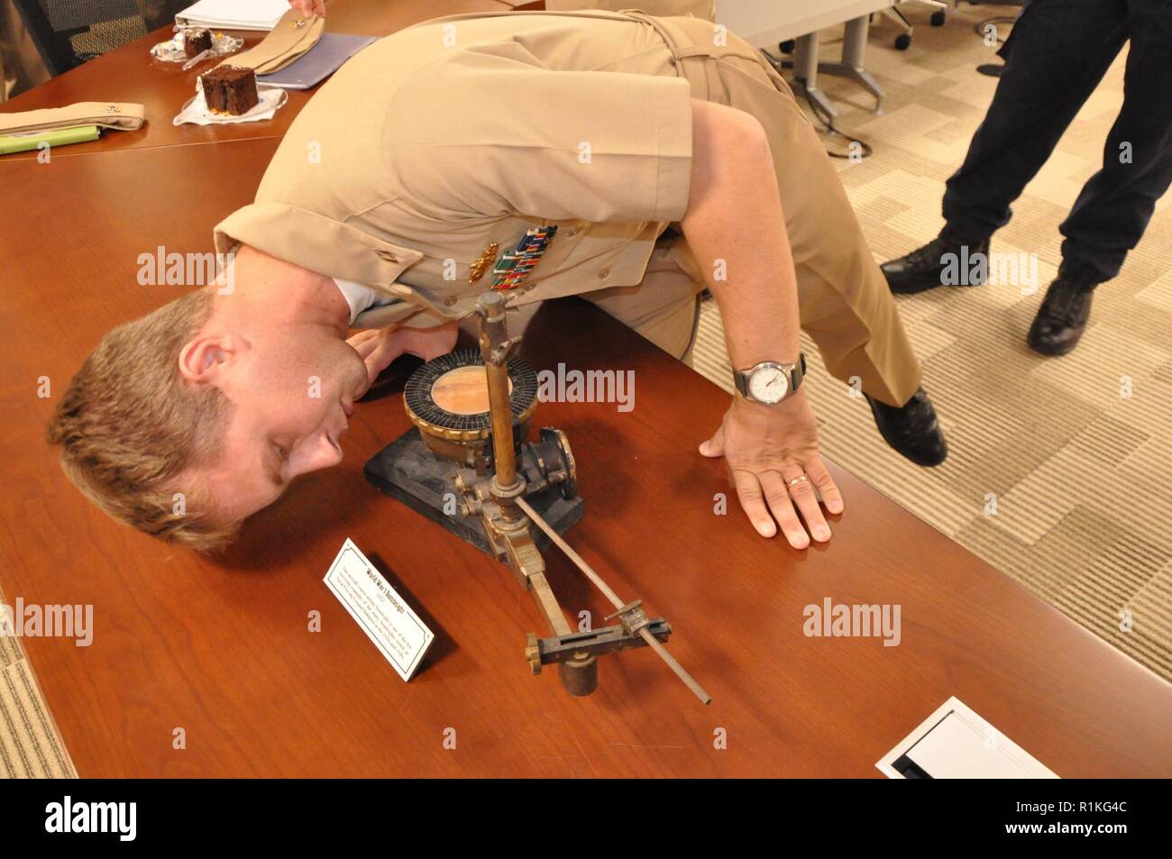 DAHLGREN, Va. (Oct. 12, 2018) - Lt. Adam Mattison examines a World War ...