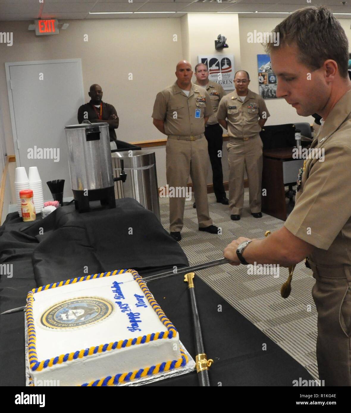DAHLGREN, Va. (Oct. 12, 2018) - Lt. Adam Mattison cuts the cake in ...