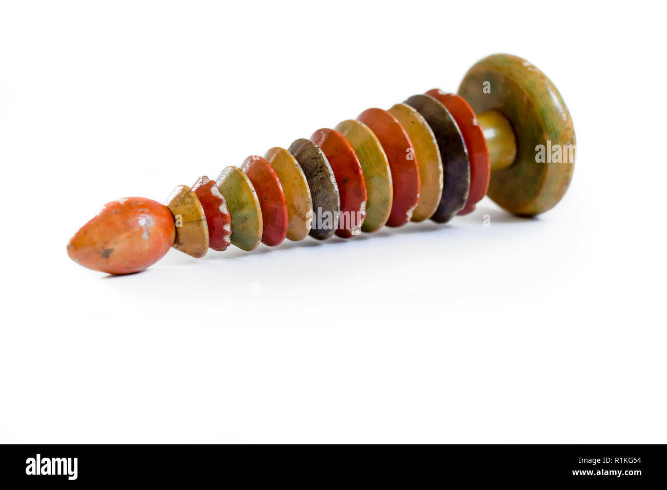 Stacking toy lying sidelong against white background. Old vintage ...