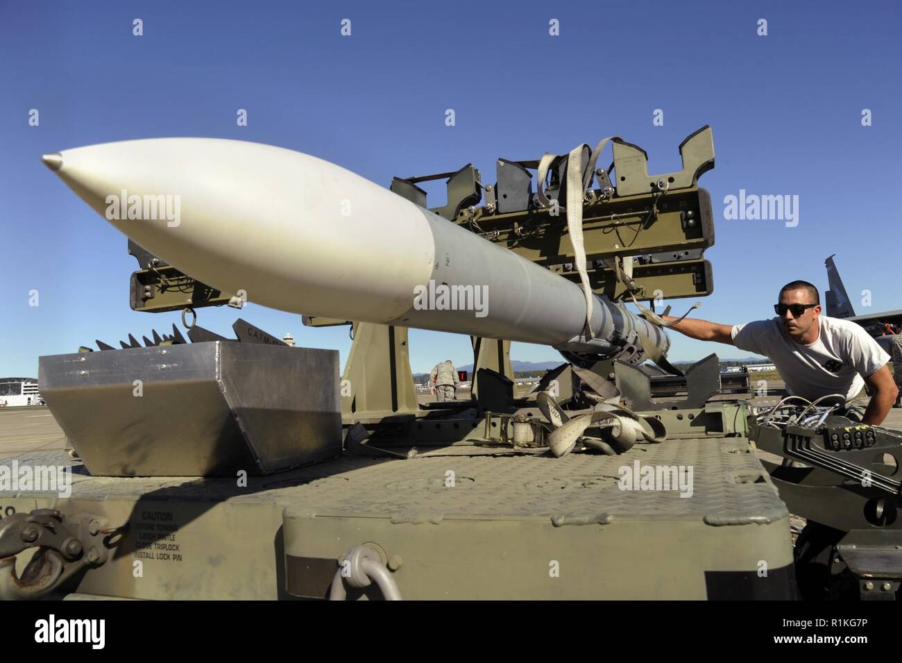 Oregon Air National Guard ‘Tan Team’ weapons loader Tech. Sgt. Jay Aebi ...