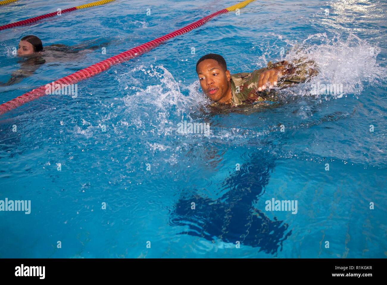 A Soldier performs a swim test as part of the German Armed Forces Badge ...