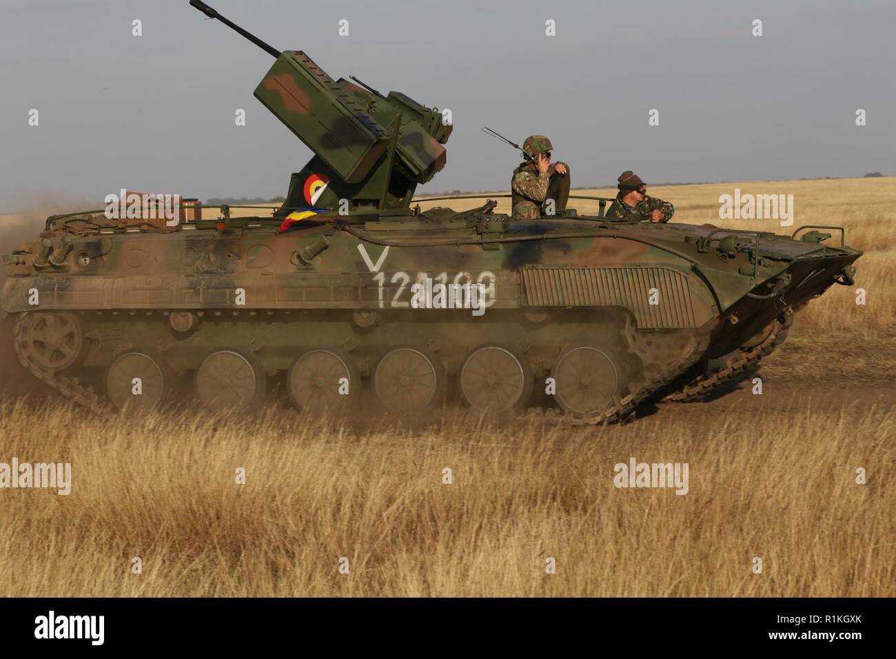 A Romanian MLVM maneuvers across a training range in Smardan, Romania ...