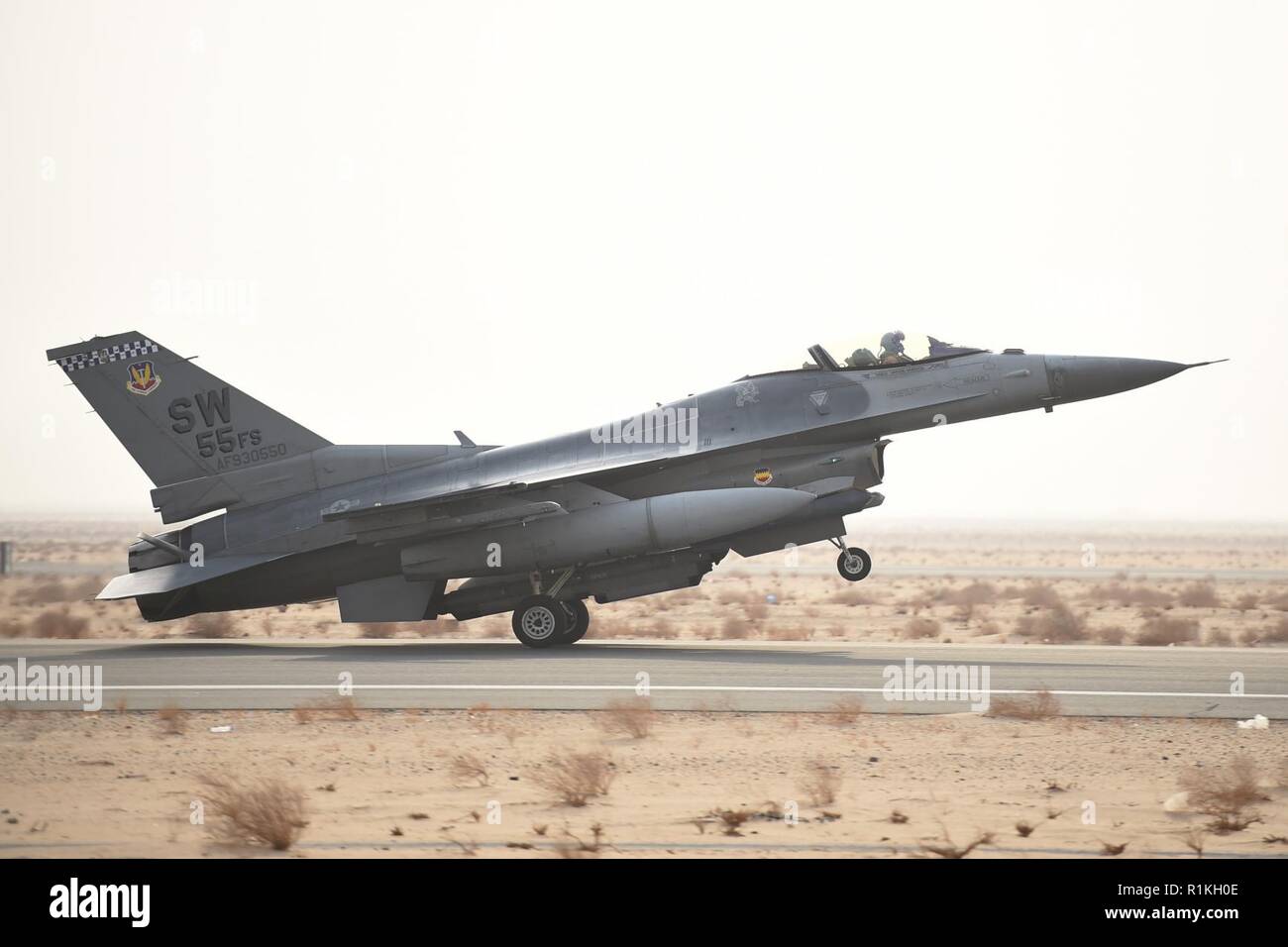 A pilot from the 55th Expeditionary Fighter Squadron lands an F-16 ...