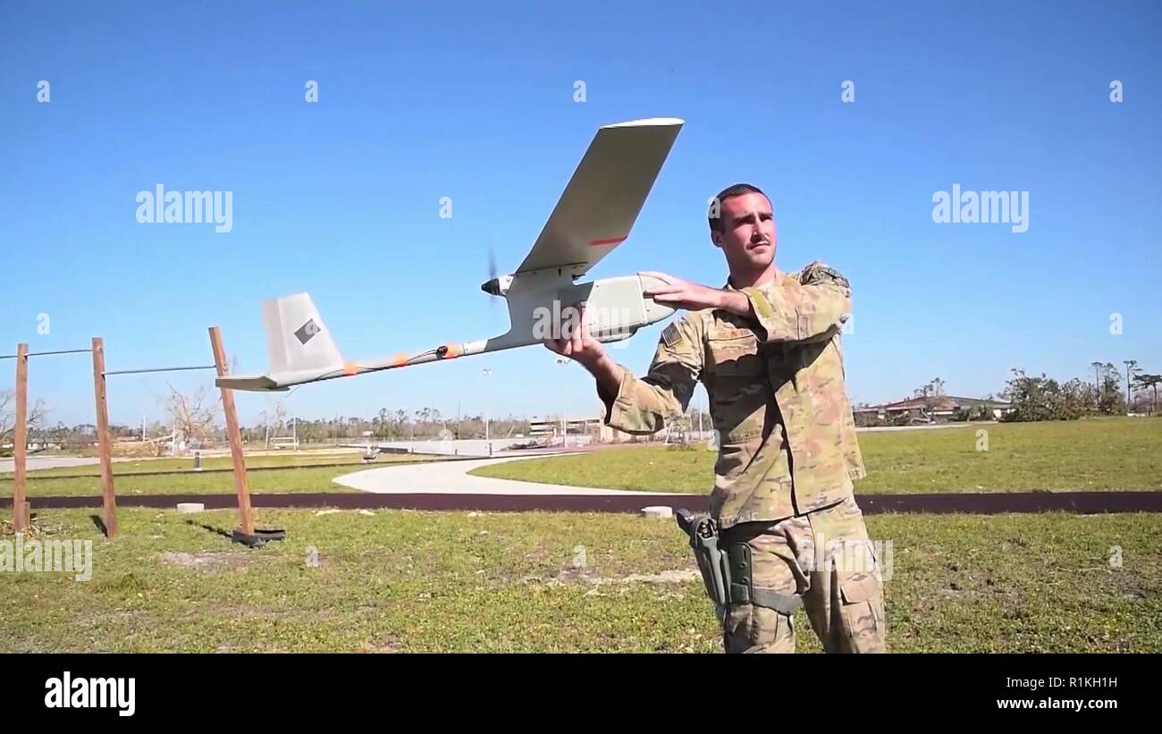 An operator launches a Raven unmanned drone Stock Photo - Alamy