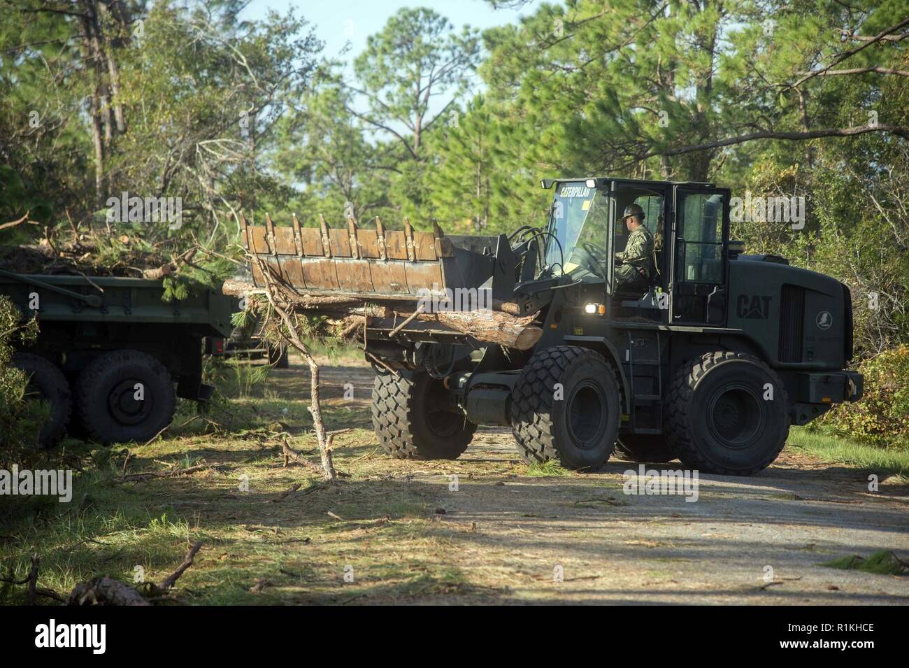 Seabees assigned to Naval Mobile Construction Battalion (NMCB) 11 work ...