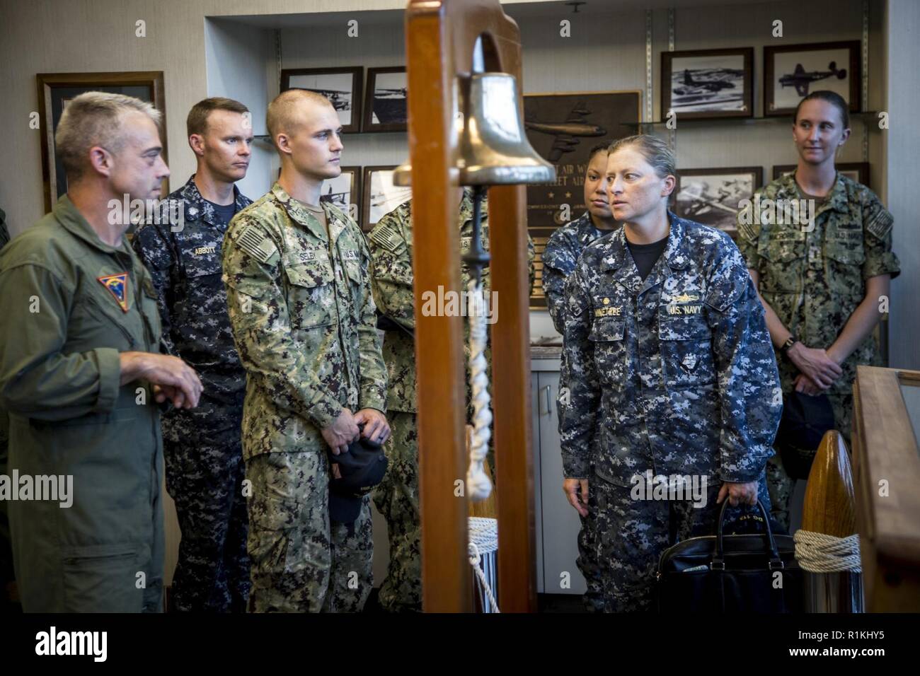 U.S. Navy Cmdr. Courtney Minetree, commanding officer of the USS John ...