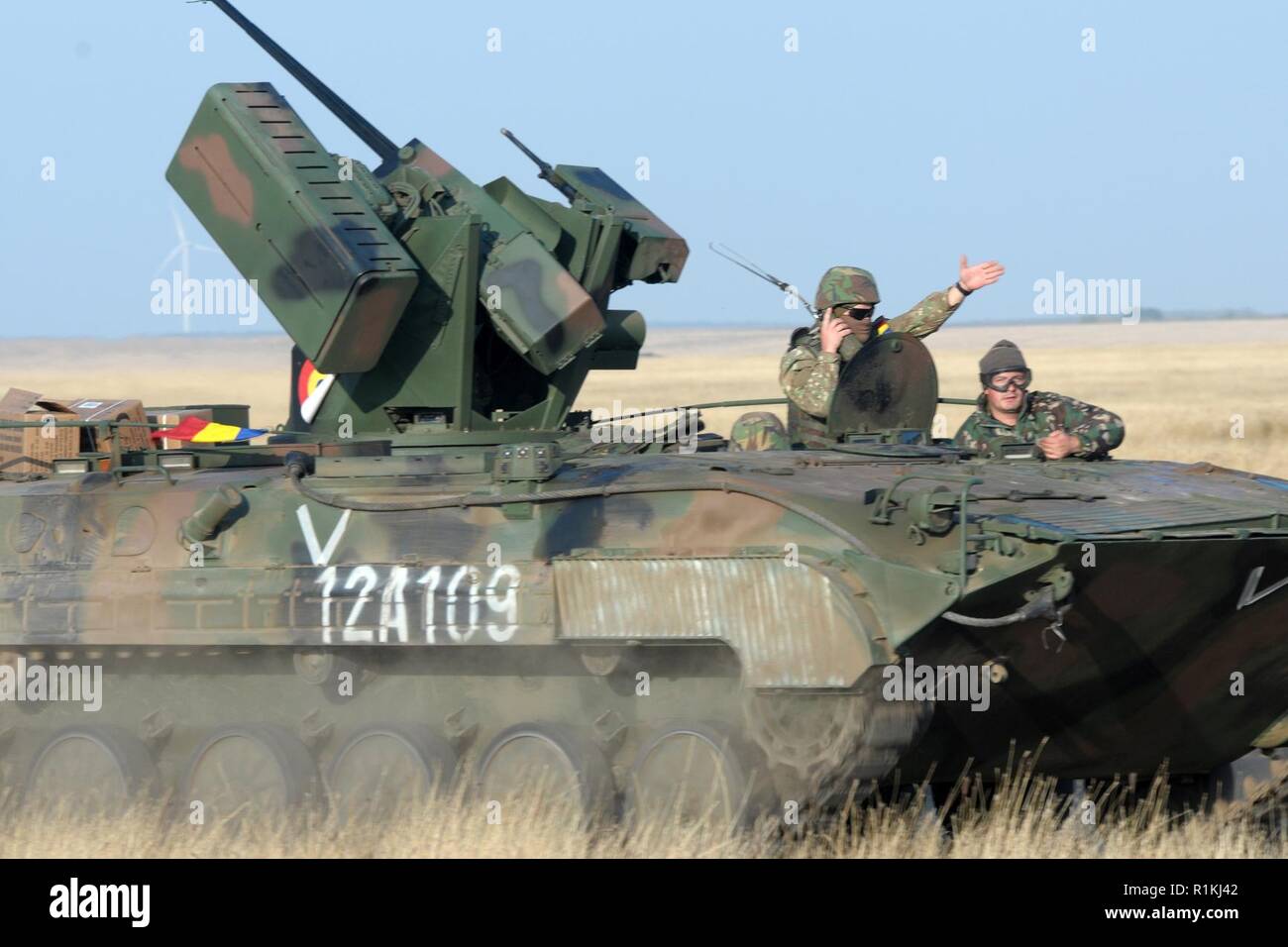 Romanian Soldiers maneuver their armored vehicle to their next fighting ...