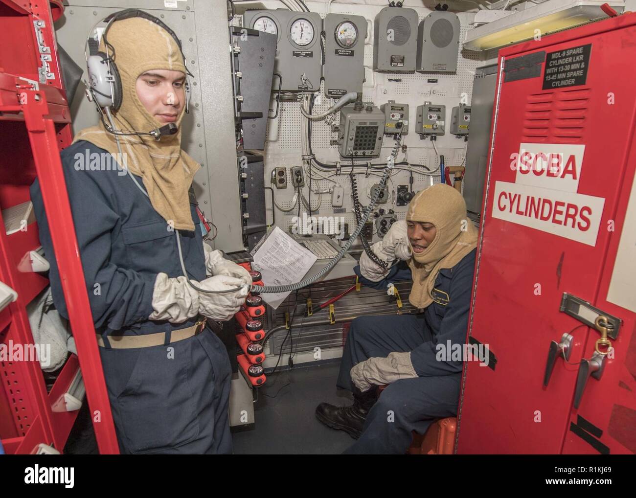 NORTH SEA (Oct. 12, 2018) Ensign Keenan Luciani, left, and Ensign Colin ...