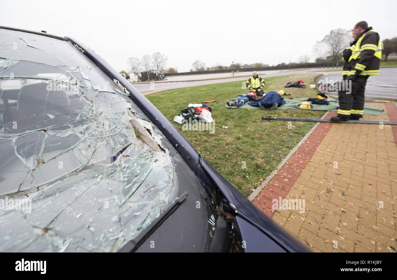 Firefighters, with the 423rd Civil Engineer Squadron, tend to simulated ...