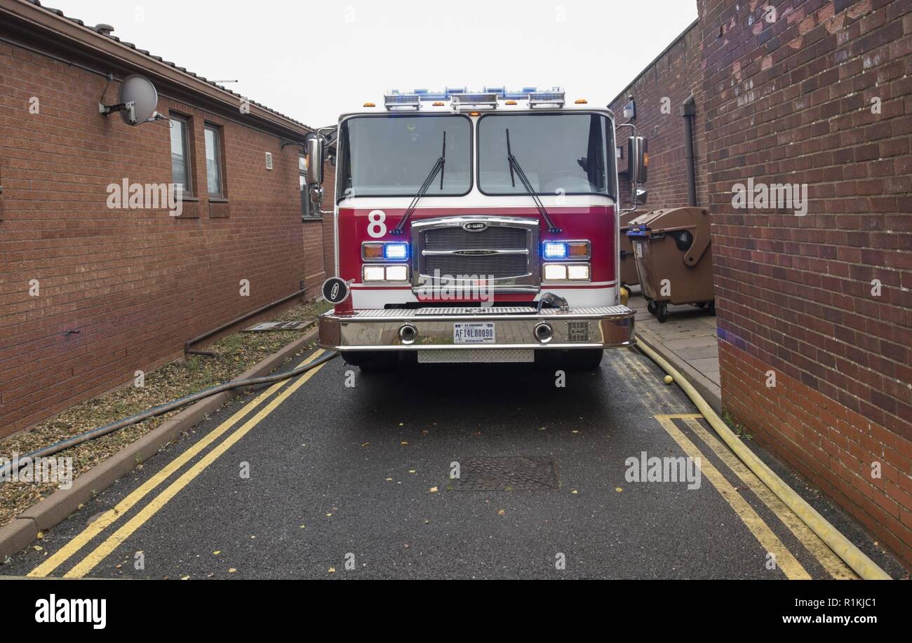 Firefighters, with 423rd Civil Engineer Squadron, respond to simulated ...