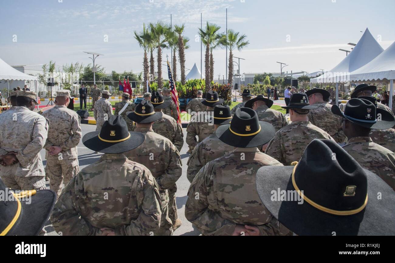 U.S. Soldiers, Marines and Jordan soldiers stand in formation during an ...