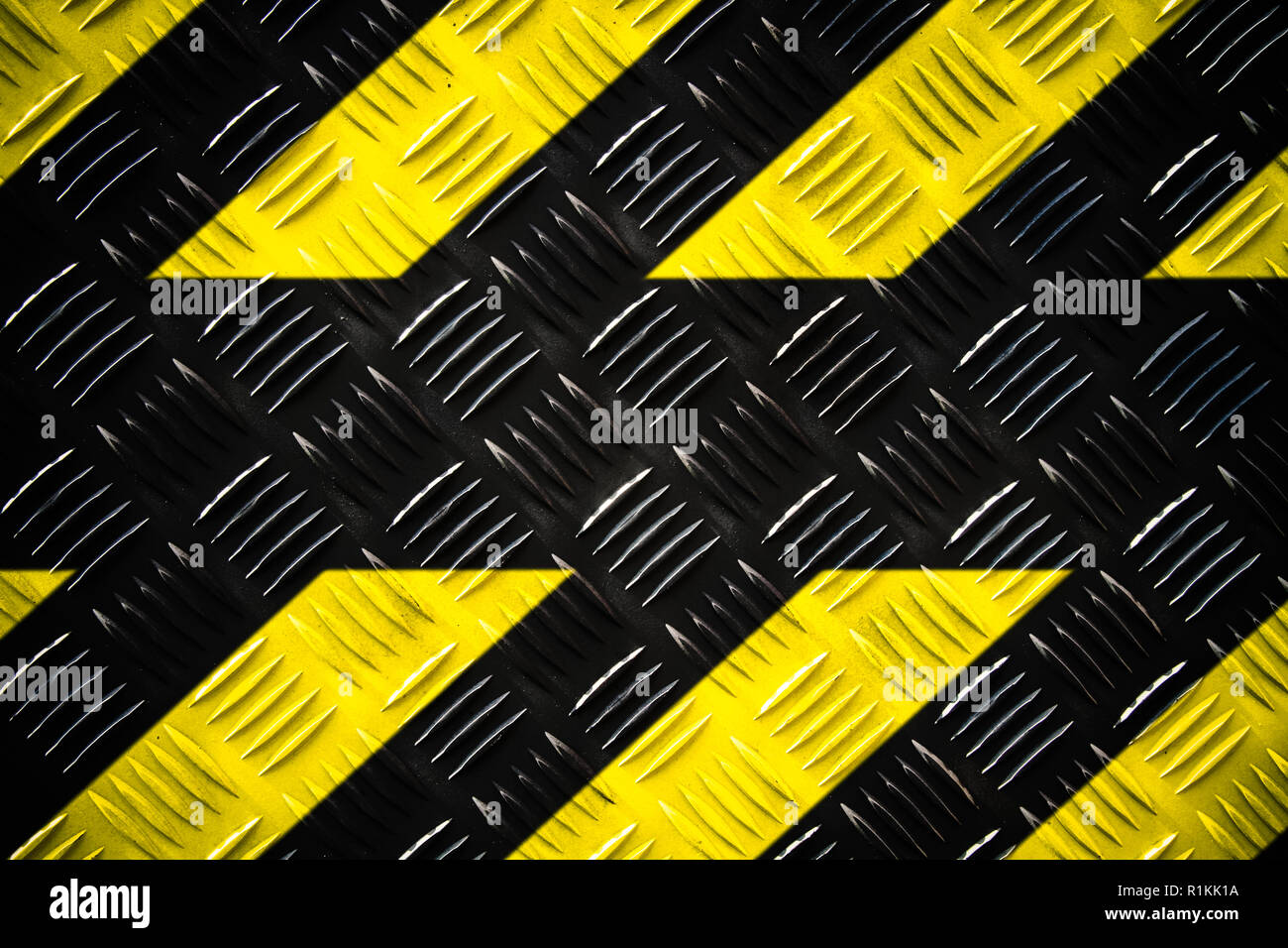Warning sign yellow and black stripes painted on steel checker plate ...