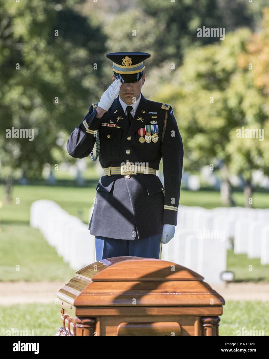 A soldier from the 3d U.S. Infantry Regiment (Old Guard) renders honors ...