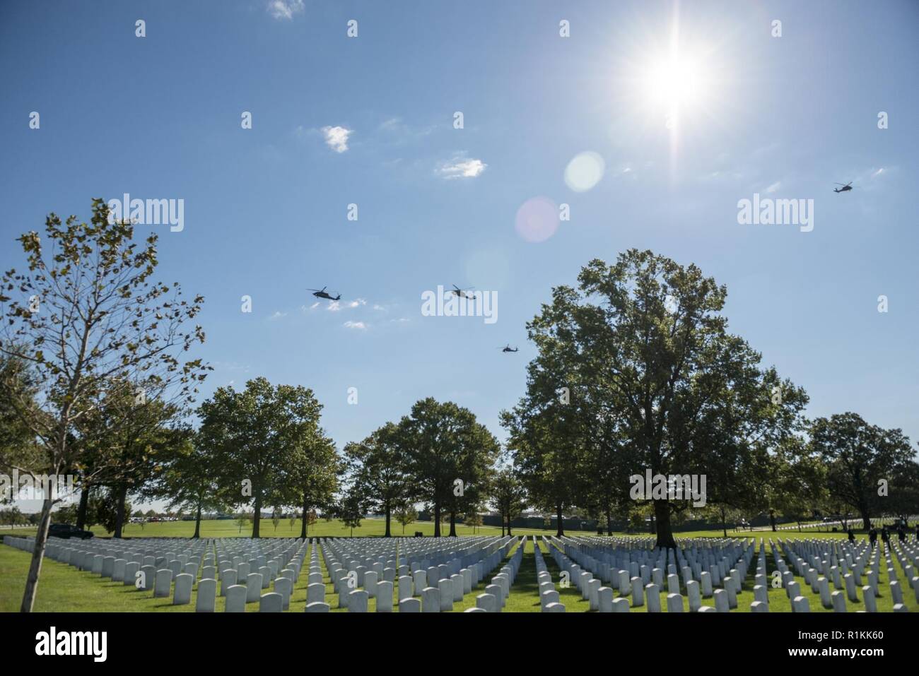 A flyover known as the Missing Man Formation passes over Section 55 at ...