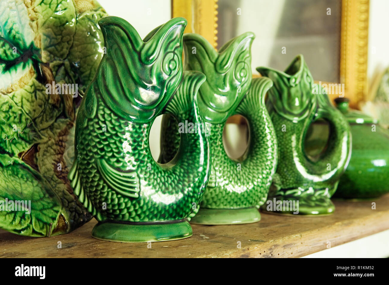 Three green fish Stock Photo - Alamy